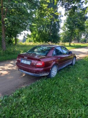 Red Audi A4 1999 in Preili, with an engine capacity of 1.80 L and mileage of 231 thousand km for 530 €, photo 8 on AUTOMOTO.COM.LV