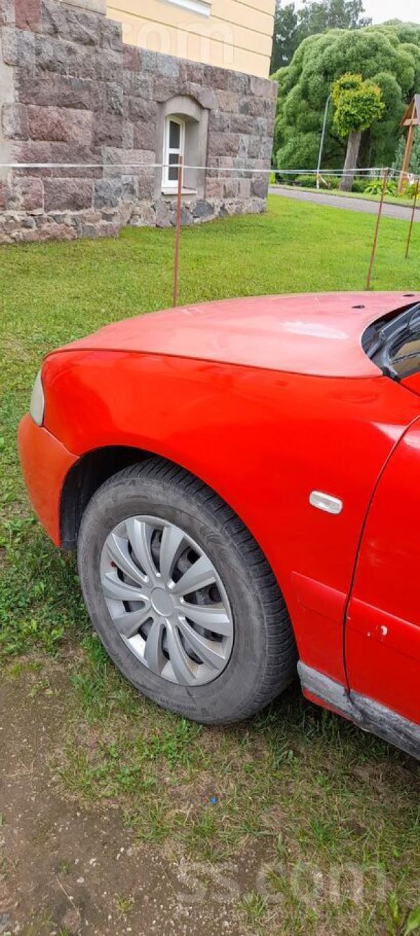 Sarkans Audi A4 2000 Dobele, ar dzinēja tilpumu 1.60 L un nobraukumu 247 tūkst. km par 400 €, foto 3 vietnē AUTOMOTO.COM.LV