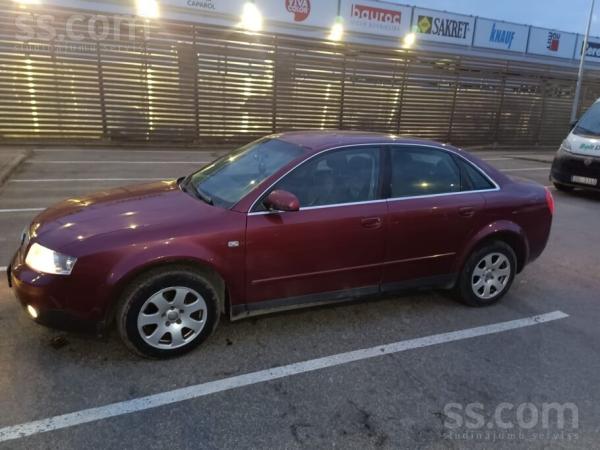 Red Audi A4 2001 in Riga, with an engine capacity of 2.00 L and mileage of 204 thousand km for 1250 €, photo 1 on AUTOMOTO.COM.LV