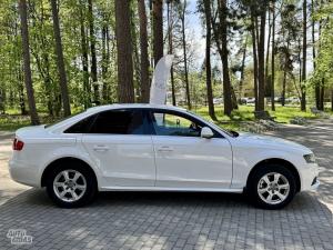 White Audi A4 2009 in Alytus, with an engine capacity of 2.00 L and mileage of 301 thousand km for 4599 €, photo 14 on AUTOMOTO.COM.LV