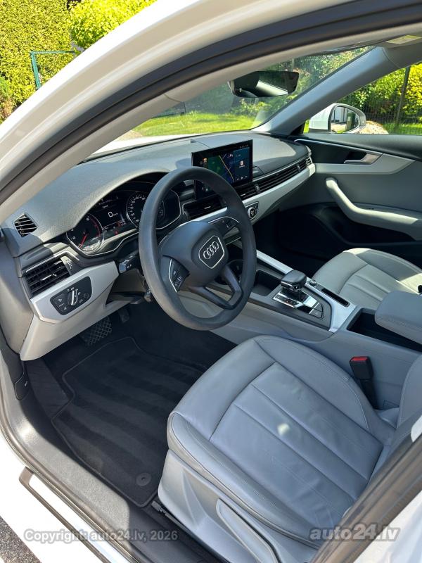 White Audi A4 2023 in Riga, with an engine capacity of 2.00 L and mileage of 61 thousand km for 24000 €, photo 4 on AUTOMOTO.COM.LV