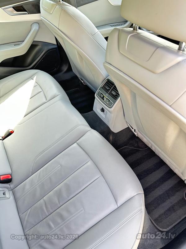 White Audi A4 2023 in Riga, with an engine capacity of 2.00 L and mileage of 61 thousand km for 24000 €, photo 9 on AUTOMOTO.COM.LV