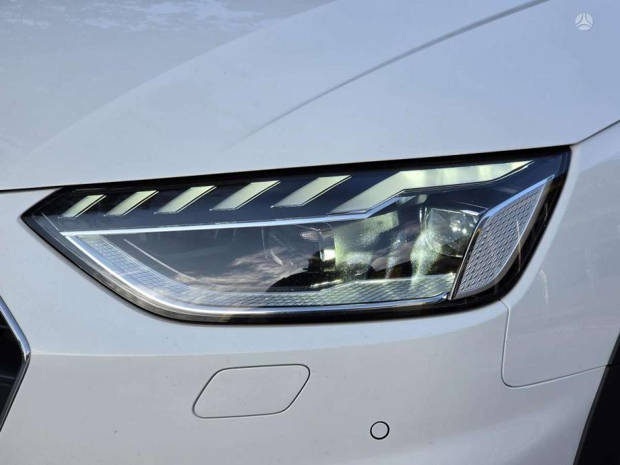 White Audi A4 2020 in Jonava, with an engine capacity of 2.00 L and mileage of 234 thousand km for 18250 €, photo 16 on AUTOMOTO.COM.LV