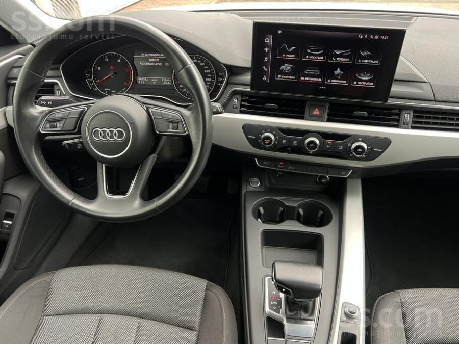 White Audi A4 2021 in Riga, with an engine capacity of 2.00 L and mileage of 236 thousand km for 14990 €, photo 18 on AUTOMOTO.COM.LV