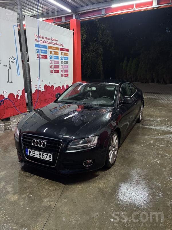 Black Audi A5 2008 in Riga, with an engine capacity of 2.00 L and mileage of 216 thousand km for 5750 €, photo 1 on AUTOMOTO.COM.LV