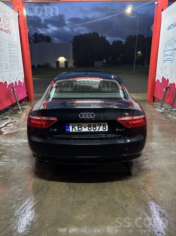 Black Audi A5 2008 in Riga, with an engine capacity of 2.00 L and mileage of 216 thousand km for 5750 €, photo 4 on AUTOMOTO.COM.LV