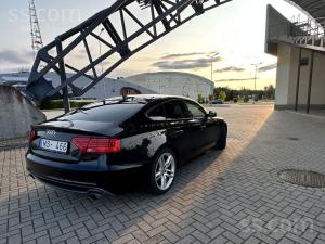 Black Audi A5 2012 in Riga, with an engine capacity of 1.80 L and mileage of 242 thousand km for 8900 €, photo 5 on AUTOMOTO.COM.LV