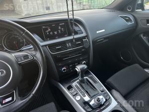 Black Audi A5 2012 in Riga, with an engine capacity of 1.80 L and mileage of 242 thousand km for 8900 €, photo 7 on AUTOMOTO.COM.LV