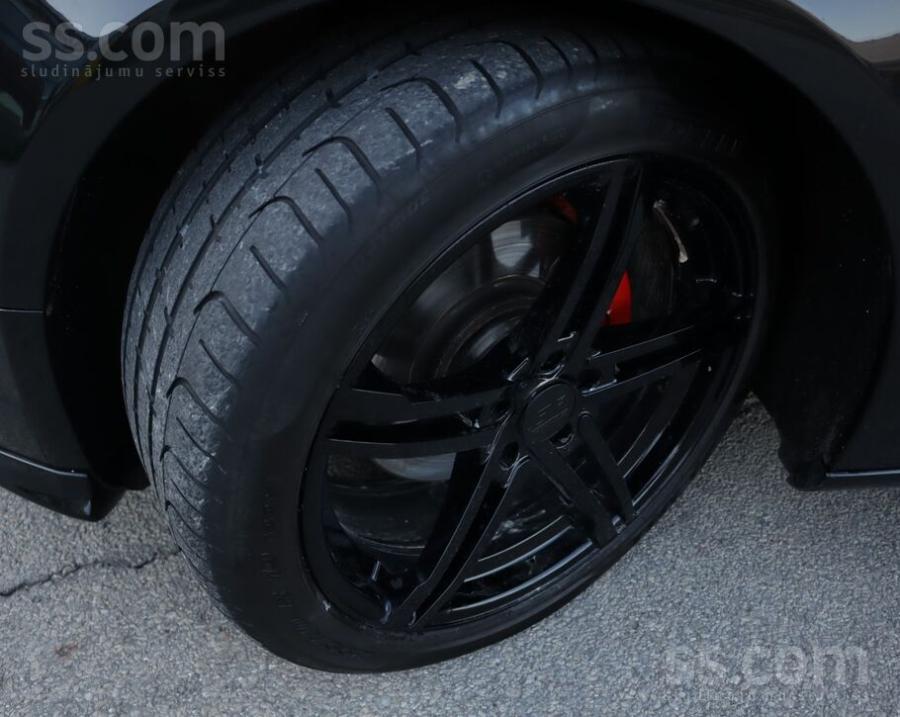 Black Audi A5 2009 in Riga, with an engine capacity of 3.00 L and mileage of 319 thousand km for 7990 €, photo 23 on AUTOMOTO.COM.LV
