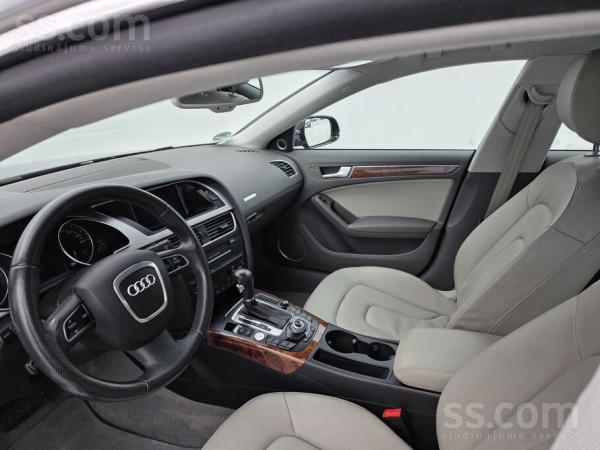 Black Audi A5 2009 in Riga, with an engine capacity of 2.00 L and mileage of 188 thousand km for 8800 €, photo 8 on AUTOMOTO.COM.LV