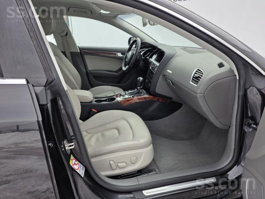 Black Audi A5 2009 in Riga, with an engine capacity of 2.00 L and mileage of 188 thousand km for 8800 €, photo 21 on AUTOMOTO.COM.LV