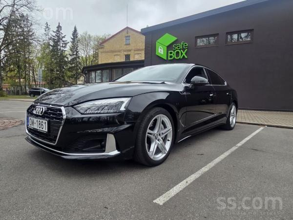 Black Audi A5 2021 in Riga, with an engine capacity of 3.00 L and mileage of 0 thousand km for 29900 €, photo 1 on AUTOMOTO.COM.LV