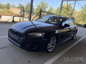 Black Audi A5 2022 in Riga, with an engine capacity of 2.00 L and mileage of 160 thousand km for 27700 €, photo  on AUTOMOTO.COM.LV