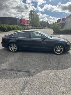 Black Audi A5 2009 in Riga, with an engine capacity of 2.00 L and mileage of 343 thousand km for 6250 €, photo 5 on AUTOMOTO.COM.LV
