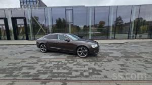 Brown Audi A5 2013 in Riga, with an engine capacity of 1.80 L and mileage of 160 thousand km for 11950 €, photo 7 on AUTOMOTO.COM.LV