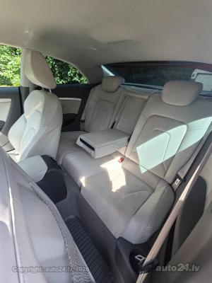 Red Audi A5 2009 in Keila, with an engine capacity of 3.00 L and mileage of 331 thousand km for 7999 €, photo 14 on AUTOMOTO.COM.LV