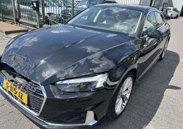 Black Audi A5 Sportback 2023 in Kaunas, with an engine capacity of 2.00 L and mileage of 84 thousand km for 20449 €, photo 1 on AUTOMOTO.COM.LV