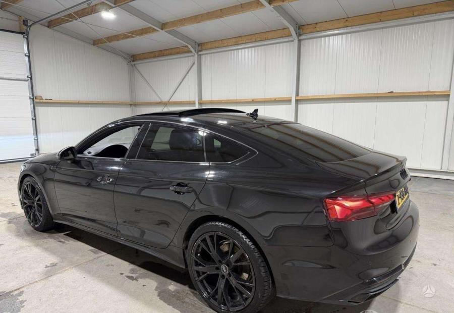 Black Audi A5 Sportback 2024 in Kaunas, with an engine capacity of 2.00 L and mileage of 73 thousand km for 21900 €, photo 7 on AUTOMOTO.COM.LV