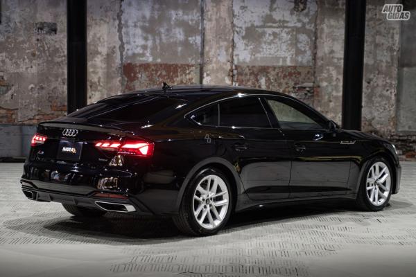 Black Audi A5 Sportback 2023 in Kaunas, with an engine capacity of 2.00 L and mileage of 10 thousand km for 25800 €, photo 2 on AUTOMOTO.COM.LV