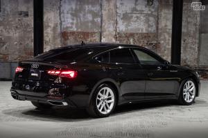 Black Audi A5 Sportback 2023 in Kaunas, with an engine capacity of 2.00 L and mileage of 10 thousand km for 25800 €, photo 3 on AUTOMOTO.COM.LV