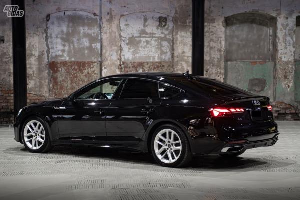 Black Audi A5 Sportback 2023 in Kaunas, with an engine capacity of 2.00 L and mileage of 10 thousand km for 25800 €, photo 3 on AUTOMOTO.COM.LV