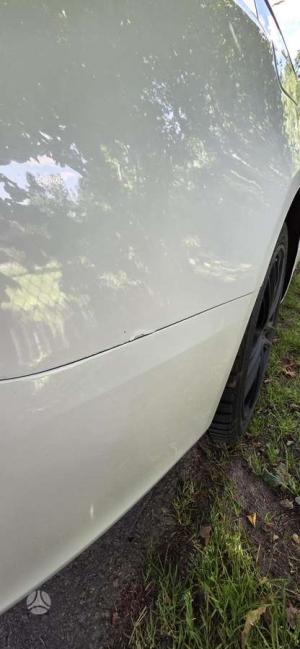 White Audi A5 Sportback 2012 in Kaunas, with an engine capacity of 1.97 L and mileage of 320 thousand km for 7499 €, photo 12 on AUTOMOTO.COM.LV