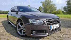 Violets Audi A5 2010 Rīga, ar dzinēja tilpumu 2.00 L un nobraukumu 138 tūkst. km par 9500 €, foto  vietnē AUTOMOTO.COM.LV