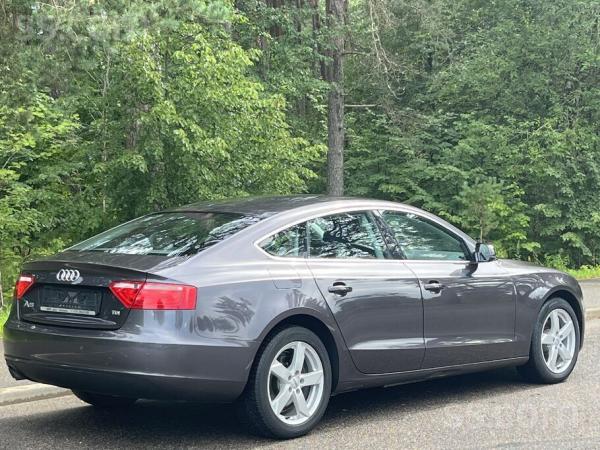 Violet Audi A5 2011 in Valmiera, with an engine capacity of 2.00 L and mileage of 0 thousand km for 8300 €, photo 4 on AUTOMOTO.COM.LV