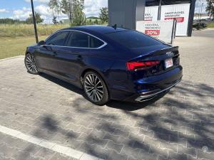 Violet Audi A5 2022 in Kaunas, with an engine capacity of 2.00 L and mileage of 156 thousand km for 26500 €, photo 5 on AUTOMOTO.COM.LV