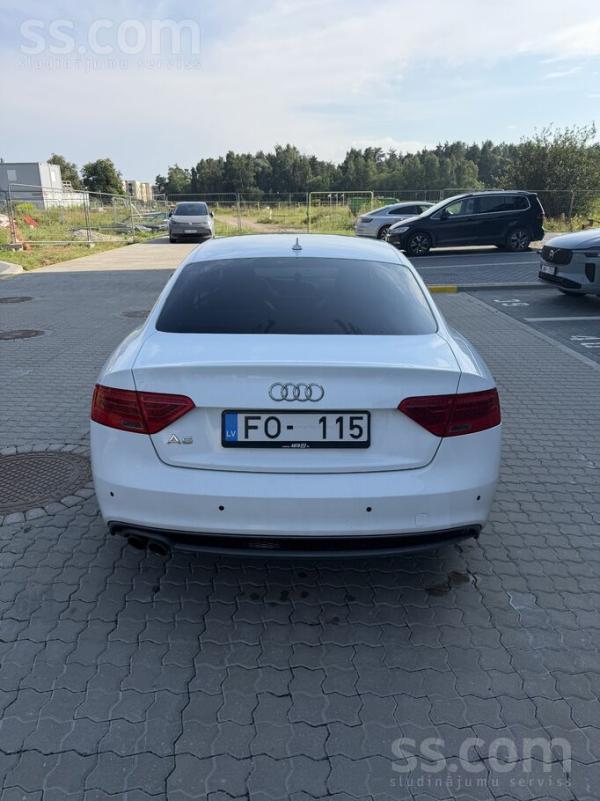 White Audi A5 2012 in Riga, with an engine capacity of 2.00 L and mileage of 310 thousand km for 9200 €, photo 6 on AUTOMOTO.COM.LV