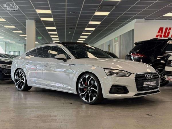 White Audi A5 2018 in Klaipeda, with an engine capacity of 3.00 L and mileage of 297 thousand km for 19950 €, photo 7 on AUTOMOTO.COM.LV