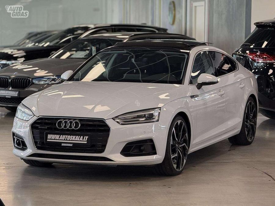White Audi A5 2018 in Klaipeda, with an engine capacity of 3.00 L and mileage of 297 thousand km for 19950 €, photo 38 on AUTOMOTO.COM.LV