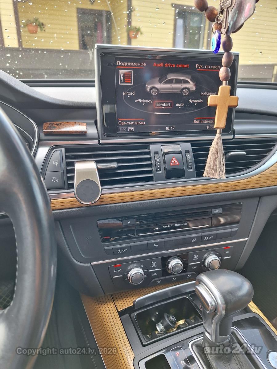 Black Audi A6 Allroad 2012 in Rakvere, with an engine capacity of 3.00 L and mileage of 293 thousand km for 14900 €, photo 18 on AUTOMOTO.COM.LV