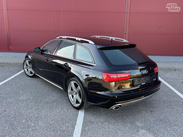 Black Audi A6 Allroad 2013 in Kaunas, with an engine capacity of 3.00 L and mileage of 289 thousand km for 11650 €, photo 4 on AUTOMOTO.COM.LV