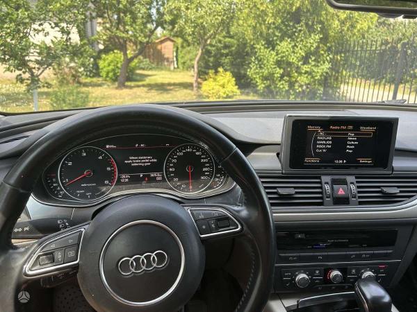 Black Audi A6 Allroad 2015 in Panevezys, with an engine capacity of 2.97 L and mileage of 243 thousand km for 13300 €, photo 6 on AUTOMOTO.COM.LV