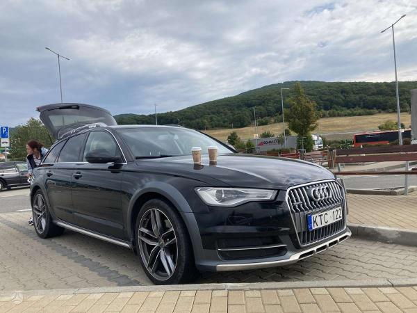 Black Audi A6 Allroad 2015 in Panevezys, with an engine capacity of 2.97 L and mileage of 243 thousand km for 13300 €, photo 8 on AUTOMOTO.COM.LV