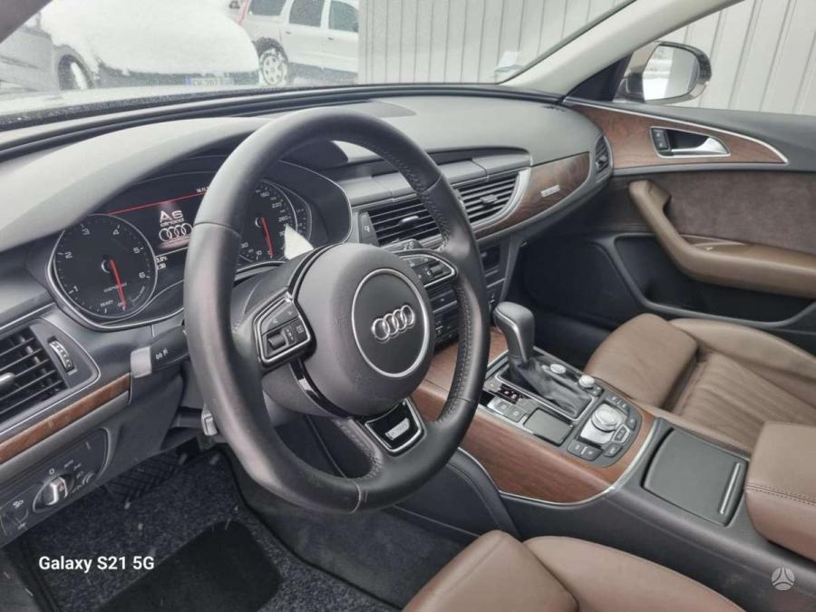 Brown Audi A6 Allroad 2015 in Taurage, with an engine capacity of 3.00 L and mileage of 267 thousand km for 13900 €, photo 7 on AUTOMOTO.COM.LV