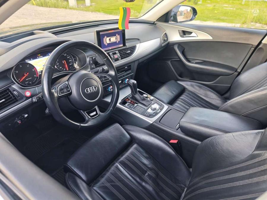 Brown Audi A6 Allroad 2015 in Vilnius, with an engine capacity of 2.97 L and mileage of 246 thousand km for 14000 €, photo 7 on AUTOMOTO.COM.LV