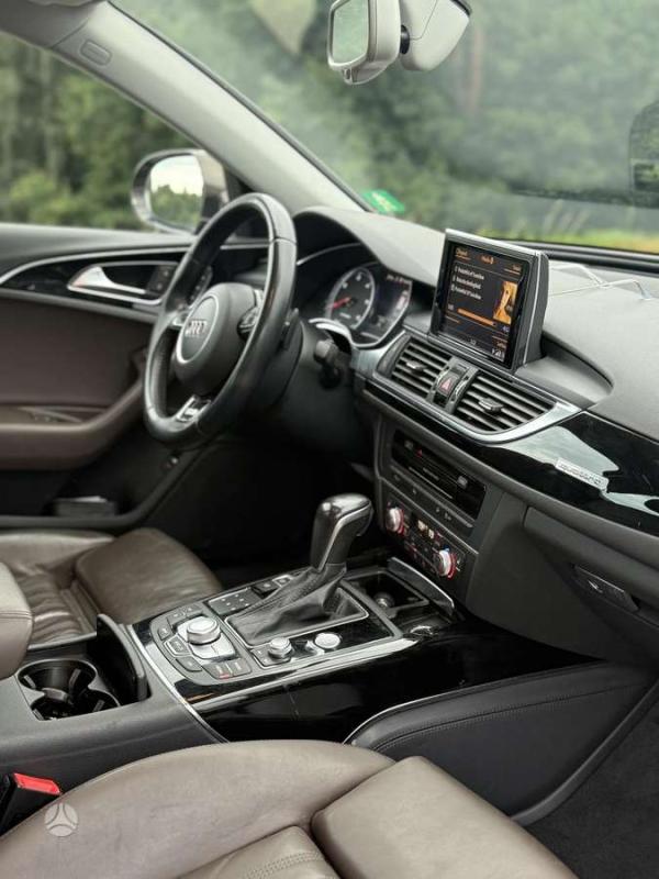 Brown Audi A6 Allroad 2015 in Jurbarkas, with an engine capacity of 2.97 L and mileage of 345 thousand km for 9999 €, photo 10 on AUTOMOTO.COM.LV