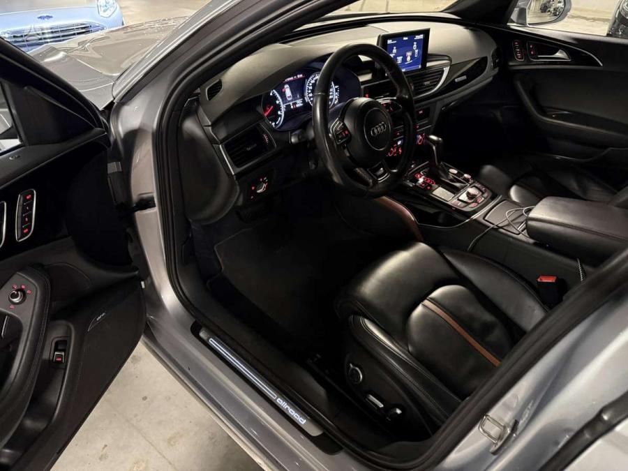 Grey Audi A6 Allroad 2016 in Utena, with an engine capacity of 2.97 L and mileage of 280 thousand km for 12999 €, photo 7 on AUTOMOTO.COM.LV