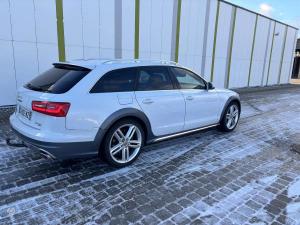 White Audi A6 Allroad 2012 in Raseiniai, with an engine capacity of 2.97 L and mileage of 253 thousand km for 12000 €, photo 14 on AUTOMOTO.COM.LV