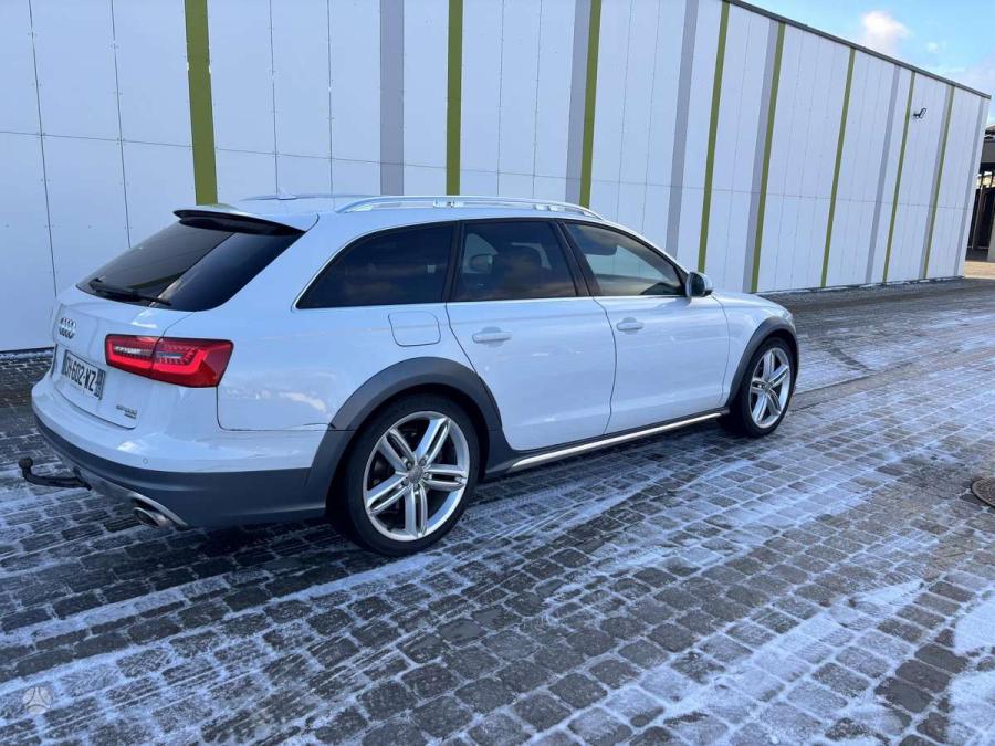 White Audi A6 Allroad 2012 in Raseiniai, with an engine capacity of 2.97 L and mileage of 253 thousand km for 12000 €, photo 14 on AUTOMOTO.COM.LV