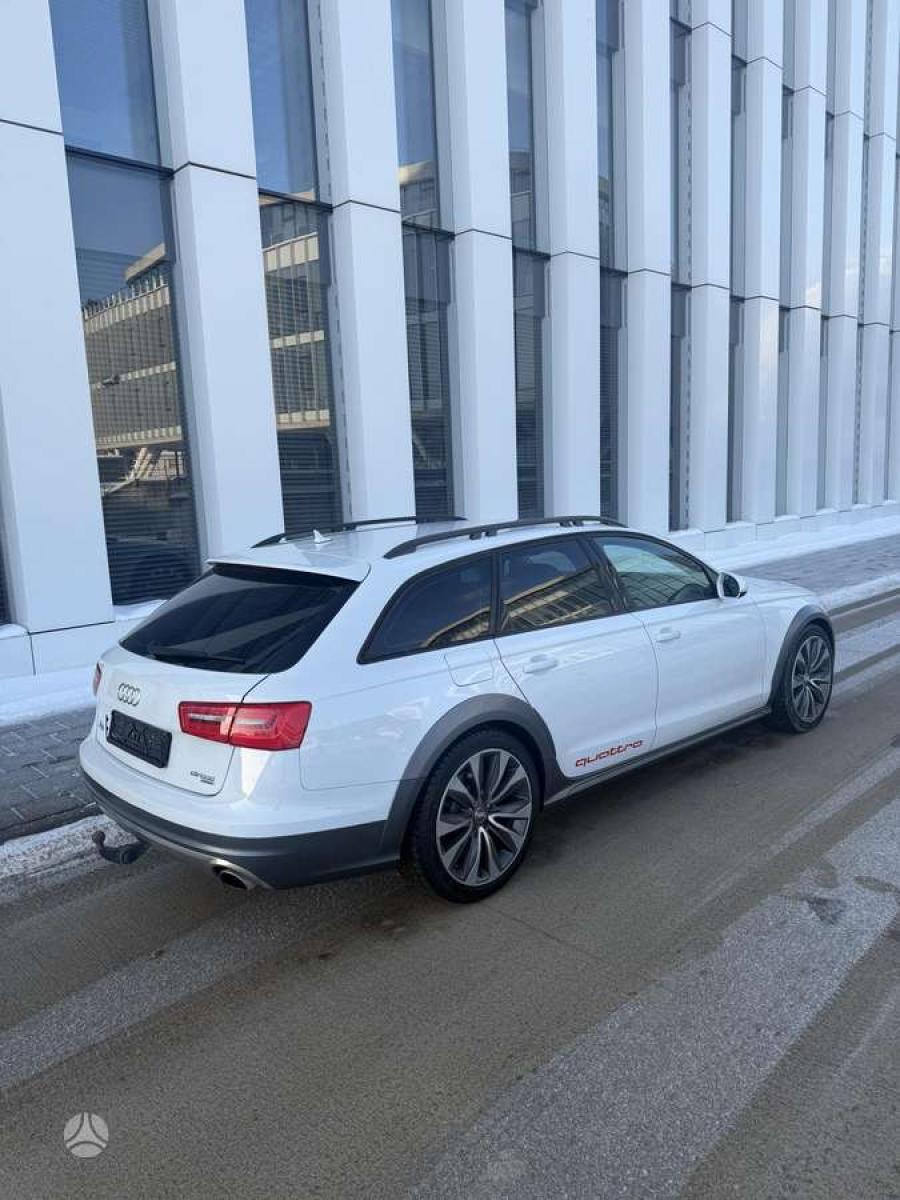 White Audi A6 Allroad 2012 in Vilnius, with an engine capacity of 3.00 L and mileage of 261 thousand km for 8999 €, photo 5 on AUTOMOTO.COM.LV