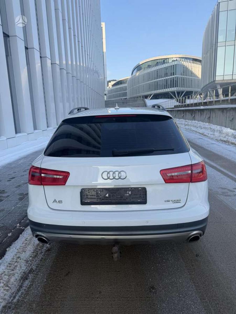White Audi A6 Allroad 2012 in Vilnius, with an engine capacity of 3.00 L and mileage of 261 thousand km for 8999 €, photo 6 on AUTOMOTO.COM.LV