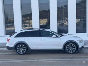 White Audi A6 Allroad 2012 in Vilnius, with an engine capacity of 3.00 L and mileage of 261 thousand km for 8999 €, photo 7 on AUTOMOTO.COM.LV