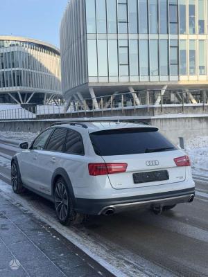 White Audi A6 Allroad 2012 in Vilnius, with an engine capacity of 3.00 L and mileage of 261 thousand km for 8999 €, photo 8 on AUTOMOTO.COM.LV
