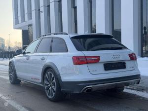 White Audi A6 Allroad 2012 in Vilnius, with an engine capacity of 3.00 L and mileage of 261 thousand km for 8999 €, photo 9 on AUTOMOTO.COM.LV