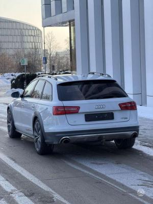 White Audi A6 Allroad 2012 in Vilnius, with an engine capacity of 3.00 L and mileage of 261 thousand km for 8999 €, photo 12 on AUTOMOTO.COM.LV