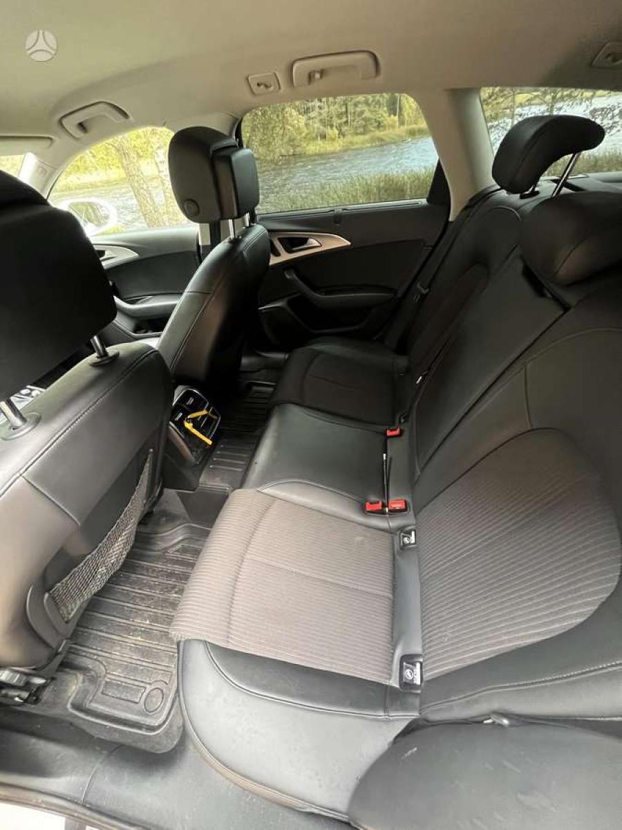White Audi A6 Allroad 2013 in Utena, with an engine capacity of 2.97 L and mileage of 333 thousand km for 12500 €, photo 9 on AUTOMOTO.COM.LV