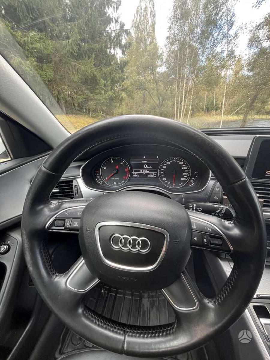 White Audi A6 Allroad 2013 in Utena, with an engine capacity of 2.97 L and mileage of 333 thousand km for 12500 €, photo 11 on AUTOMOTO.COM.LV